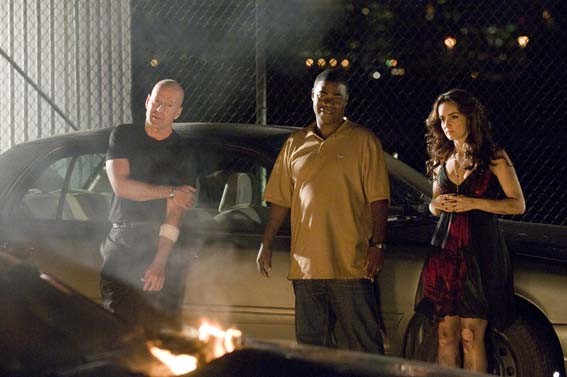 Tracy Morgan, Bruce Willis e Michelle Trachtenberg in una scena di Cop ... Tracy Morgan, Bruce Willis e Michelle Trachtenberg in una scena di Cop ...